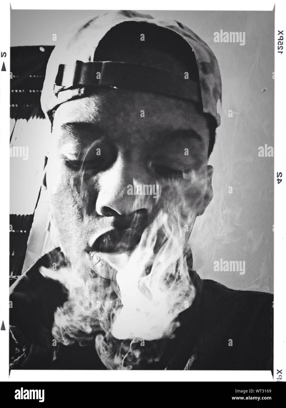 Boy with cigarette Cut Out Stock Images & Pictures - Alamy