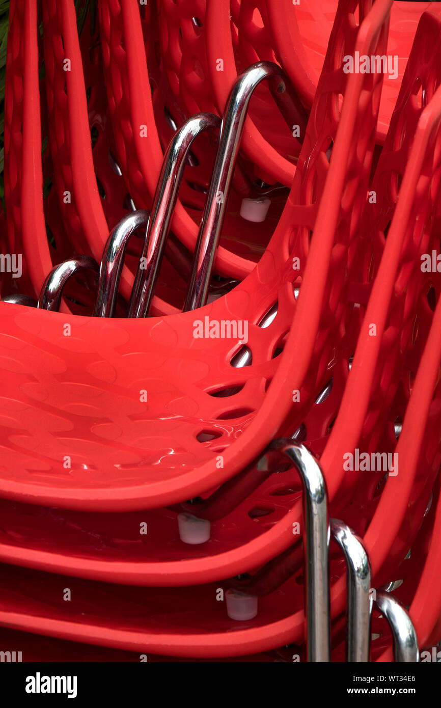 Stack of red chairs hi-res stock photography and images - Alamy