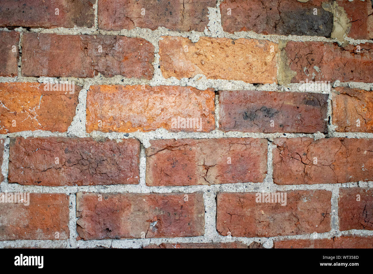 Real red brick wall background Stock Photo - Alamy