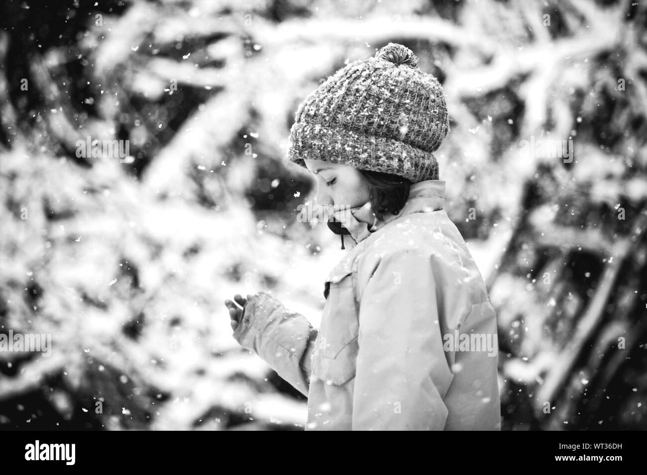 Child In The Snow Stock Photo - Alamy