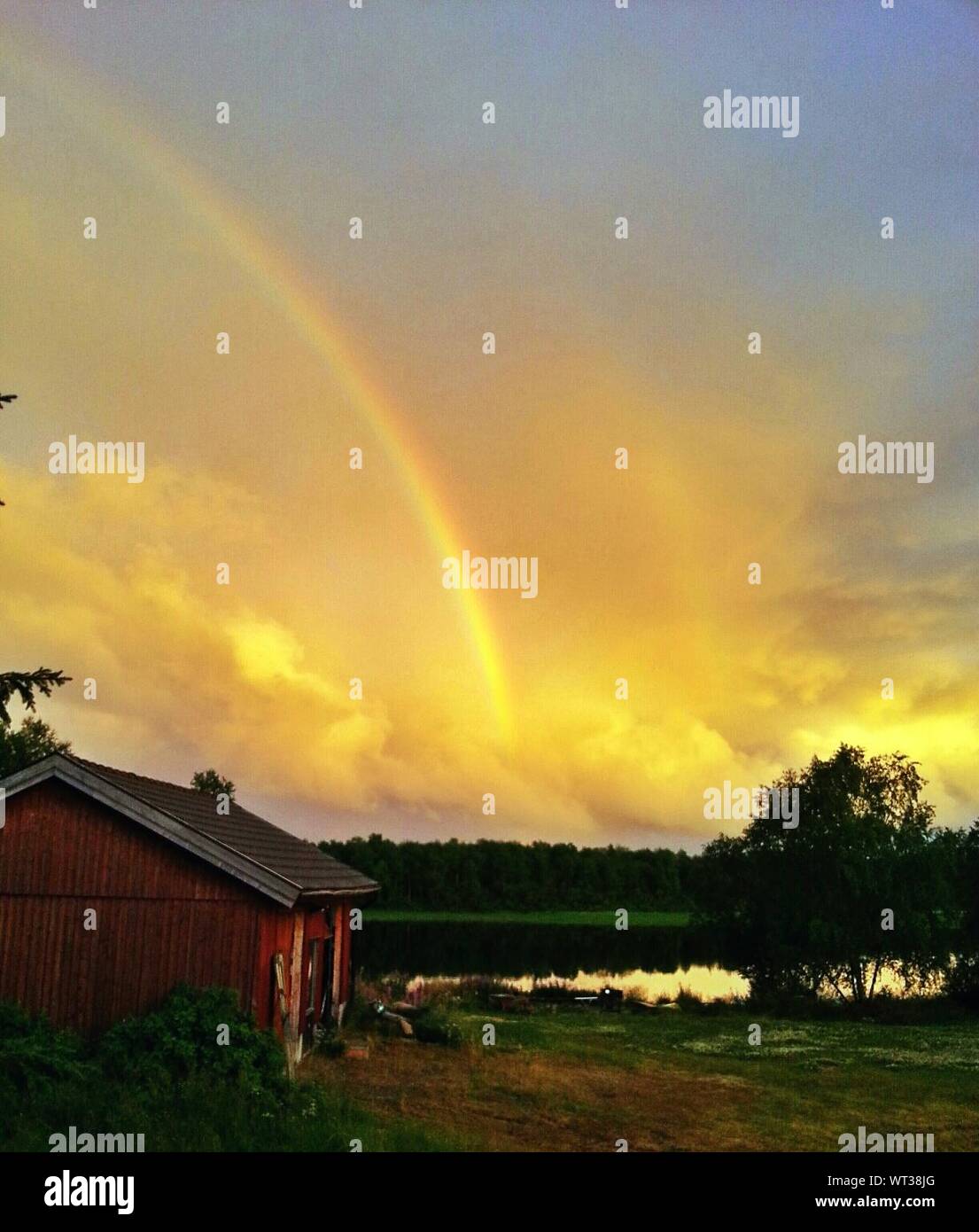 Rainbow over the lake hi-res stock photography and images - Alamy