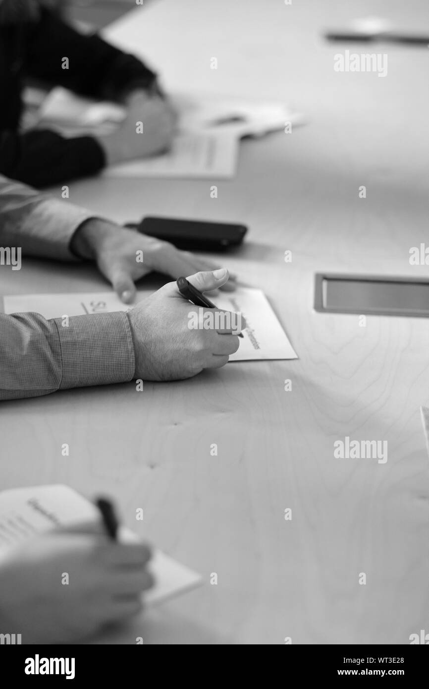 The hands of people who fill out questionnaires in paper form Stock ...