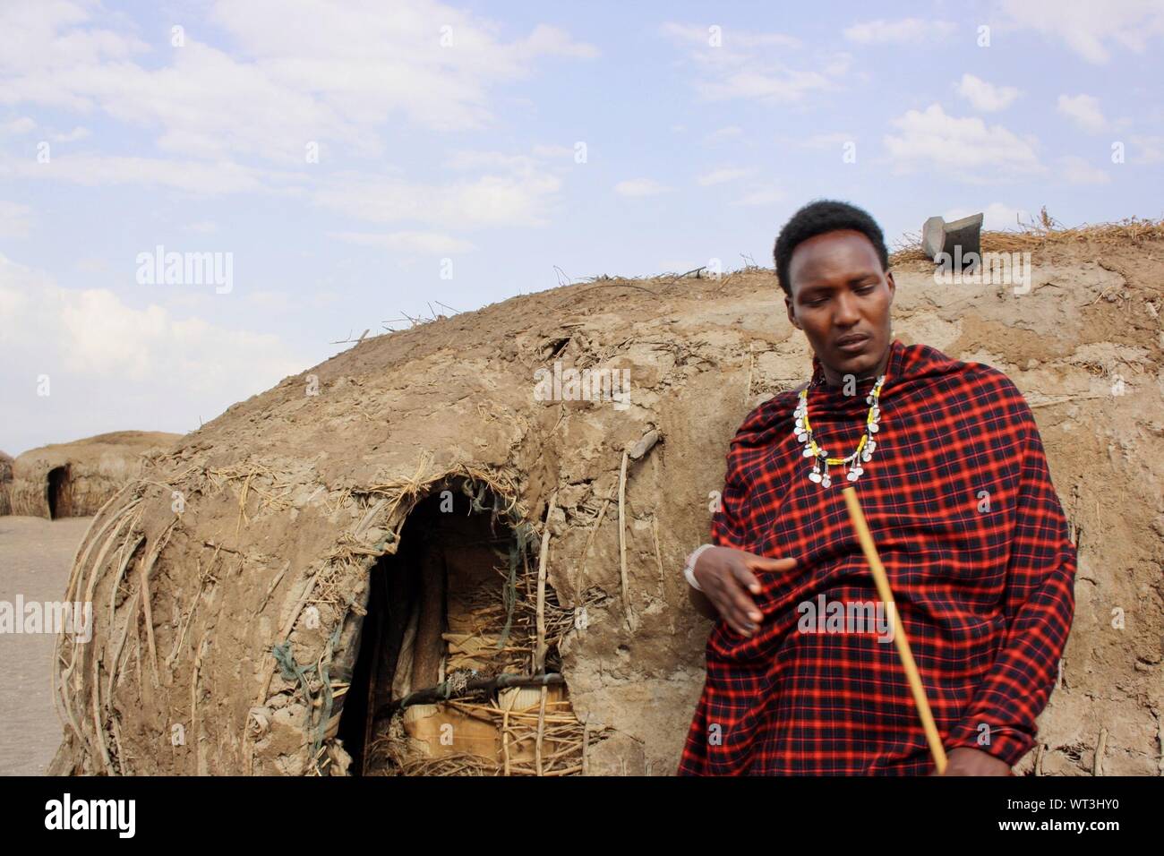 The man and the hut hi-res stock photography and images - Alamy