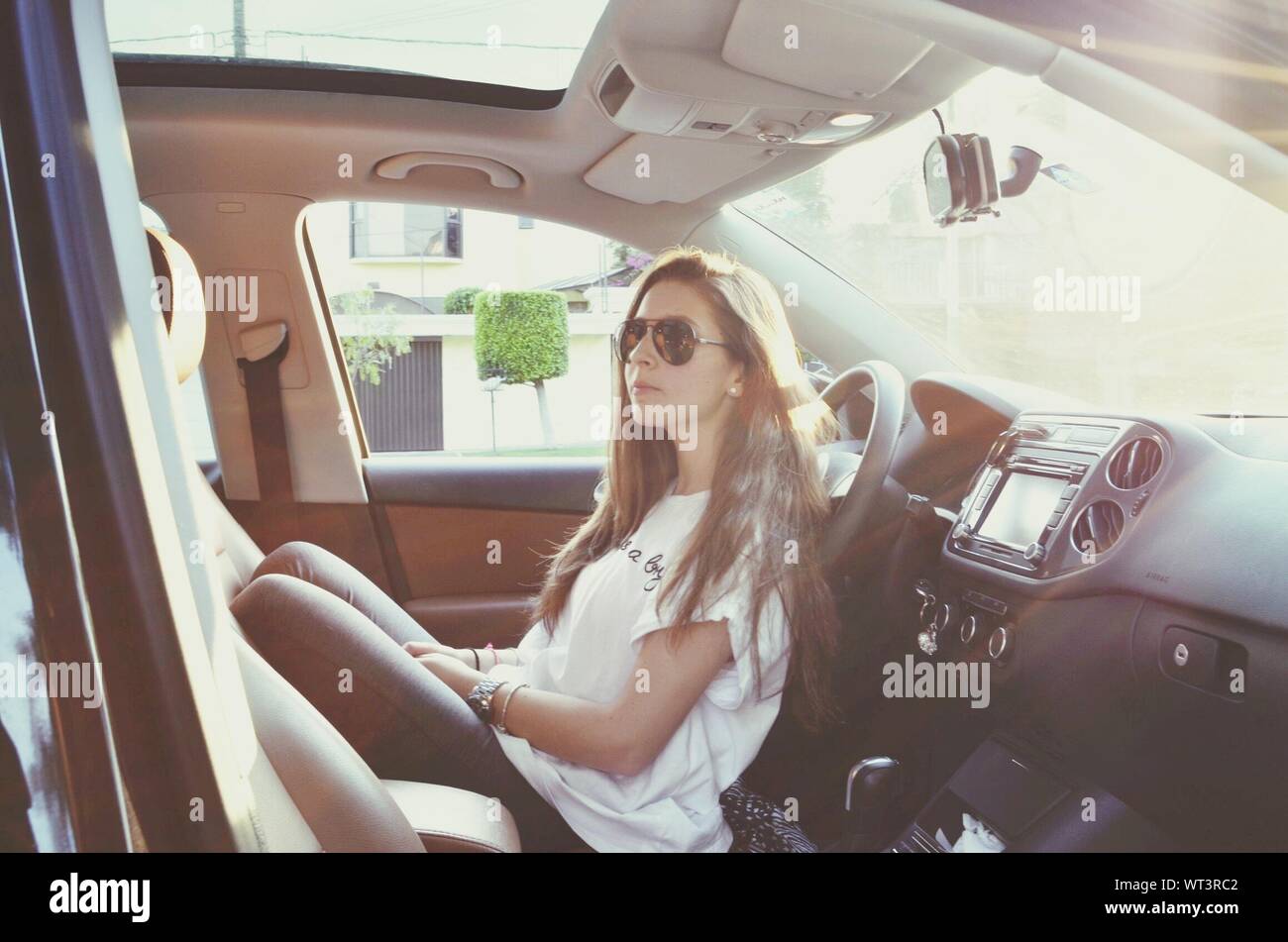 Woman in front seat of car hi-res stock photography and images - Alamy