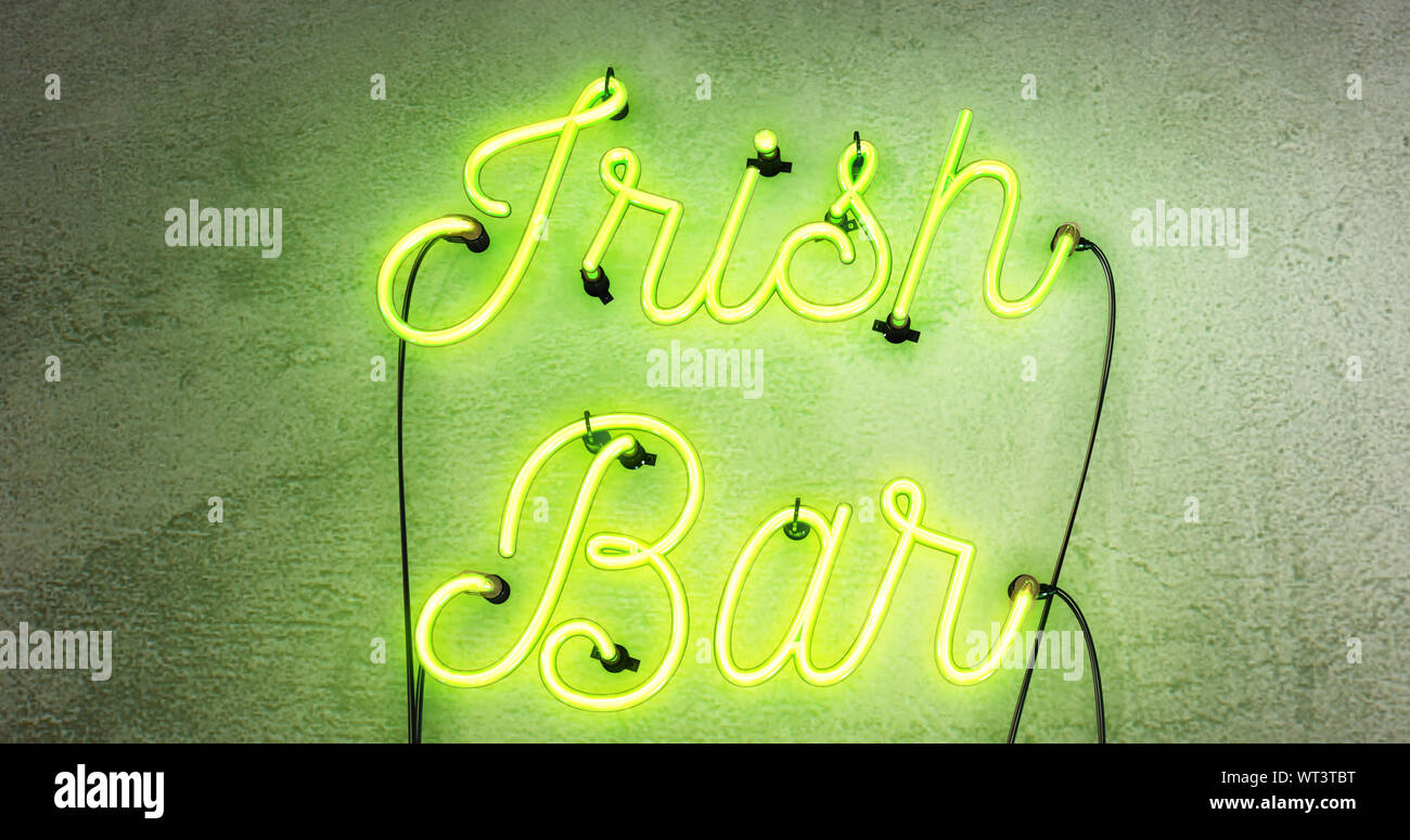 Irish Bar green neon sign that is turned on Stock Photo - Alamy