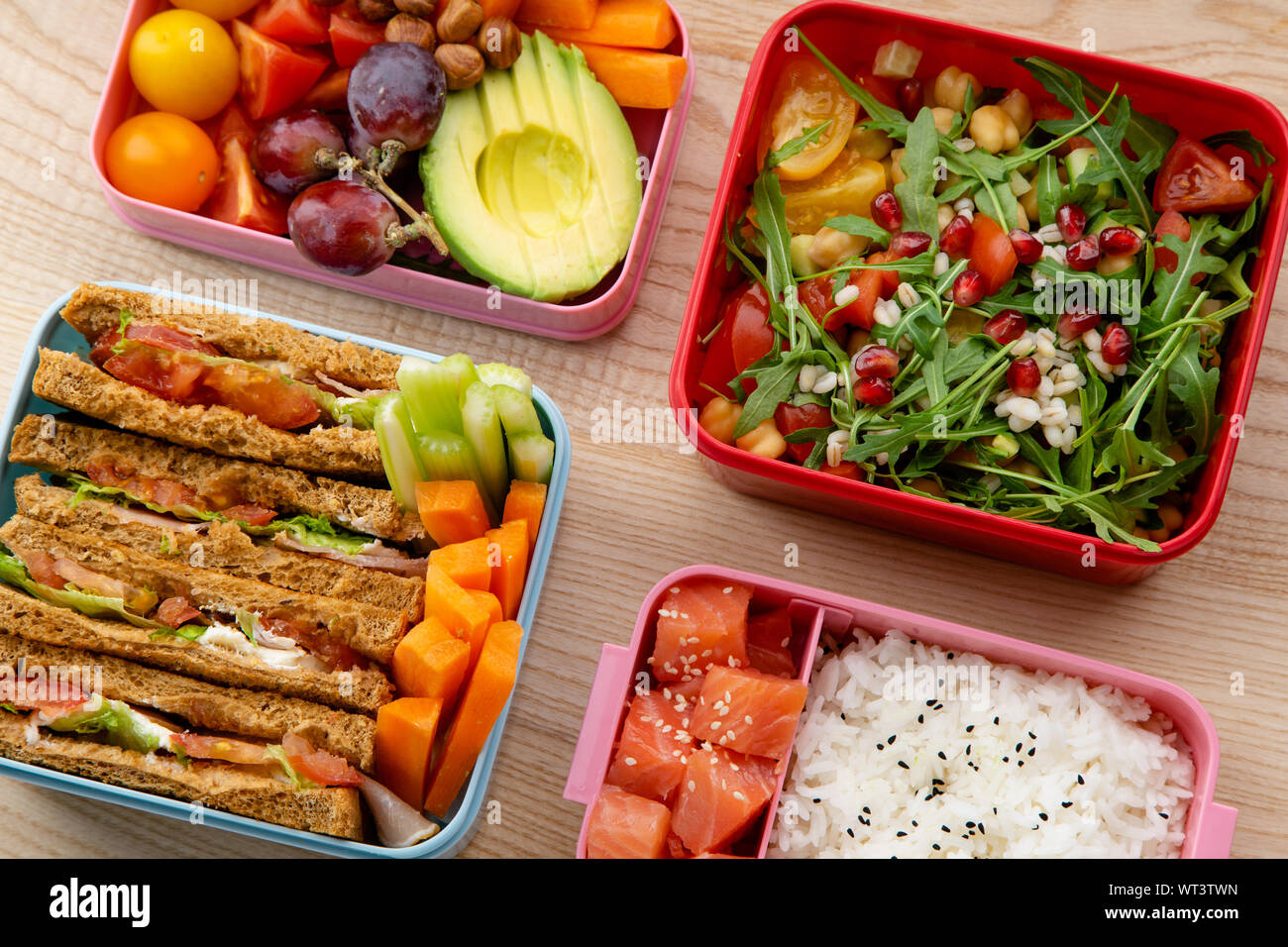 Creative layout with healthy lunch dishes variety in bento boxes on ...