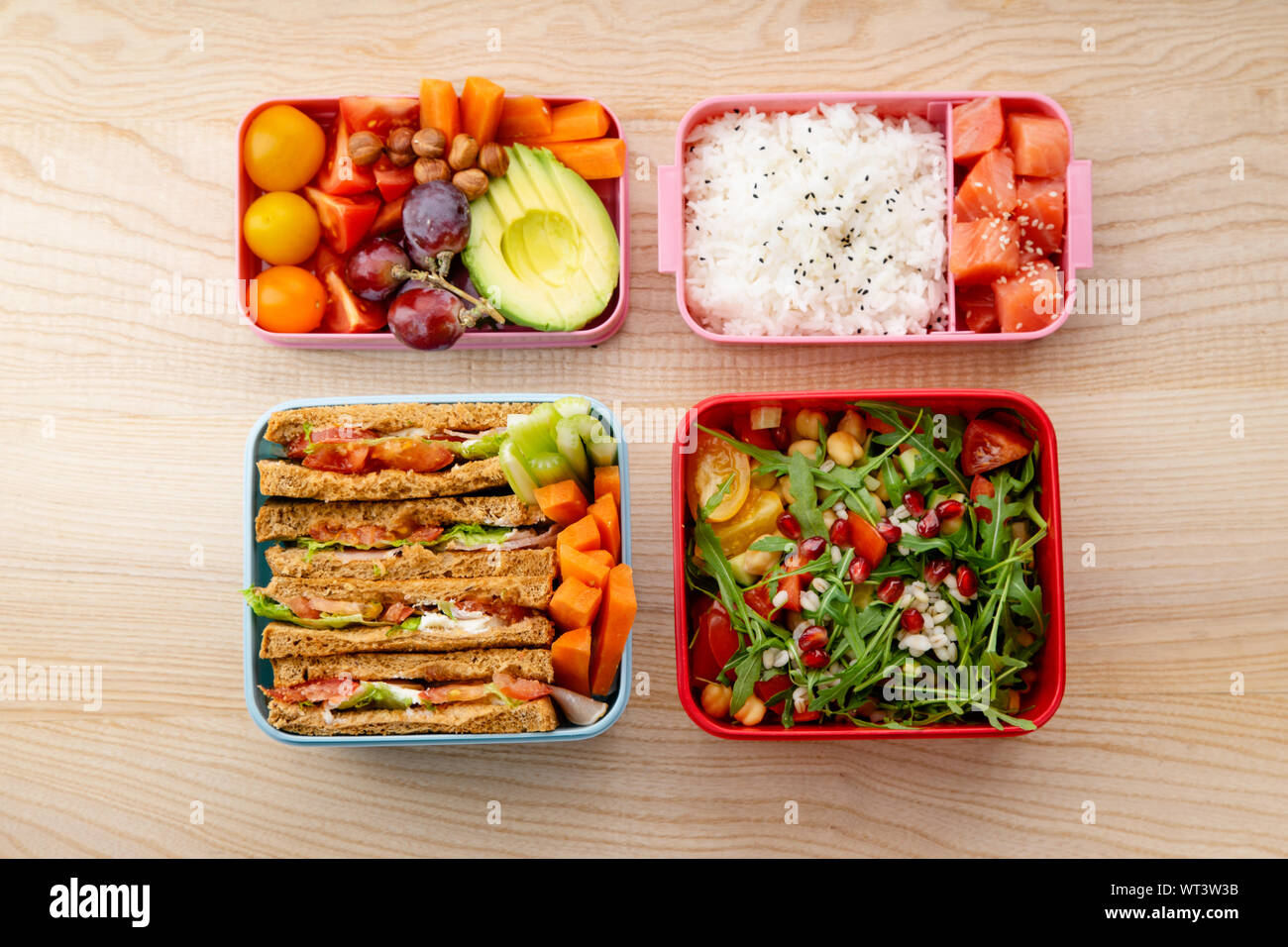 Creative layout with healthy lunch dishes variety in bento boxes on ...