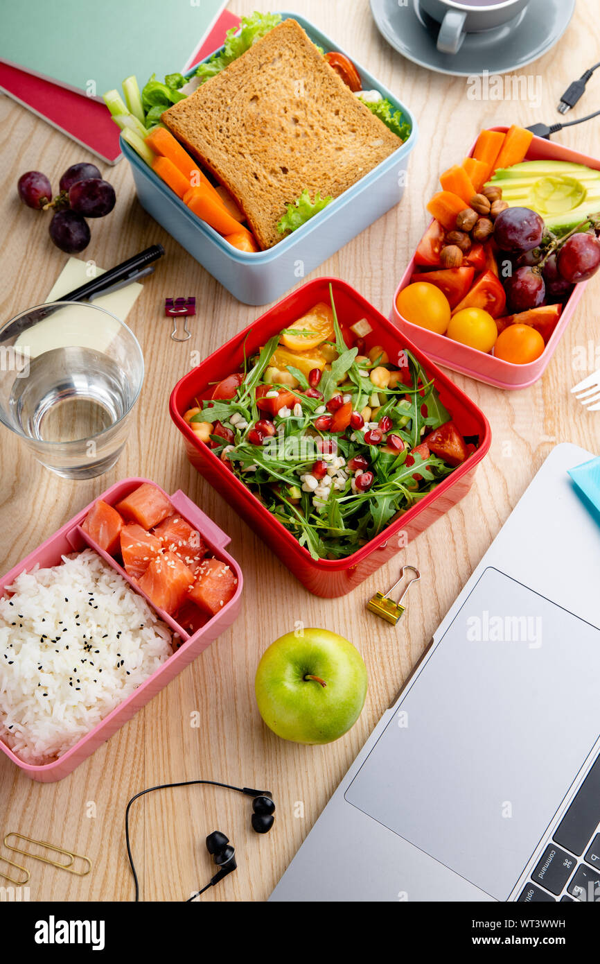 Top view shot with healthy lunch dishes variety: salad with grains ...