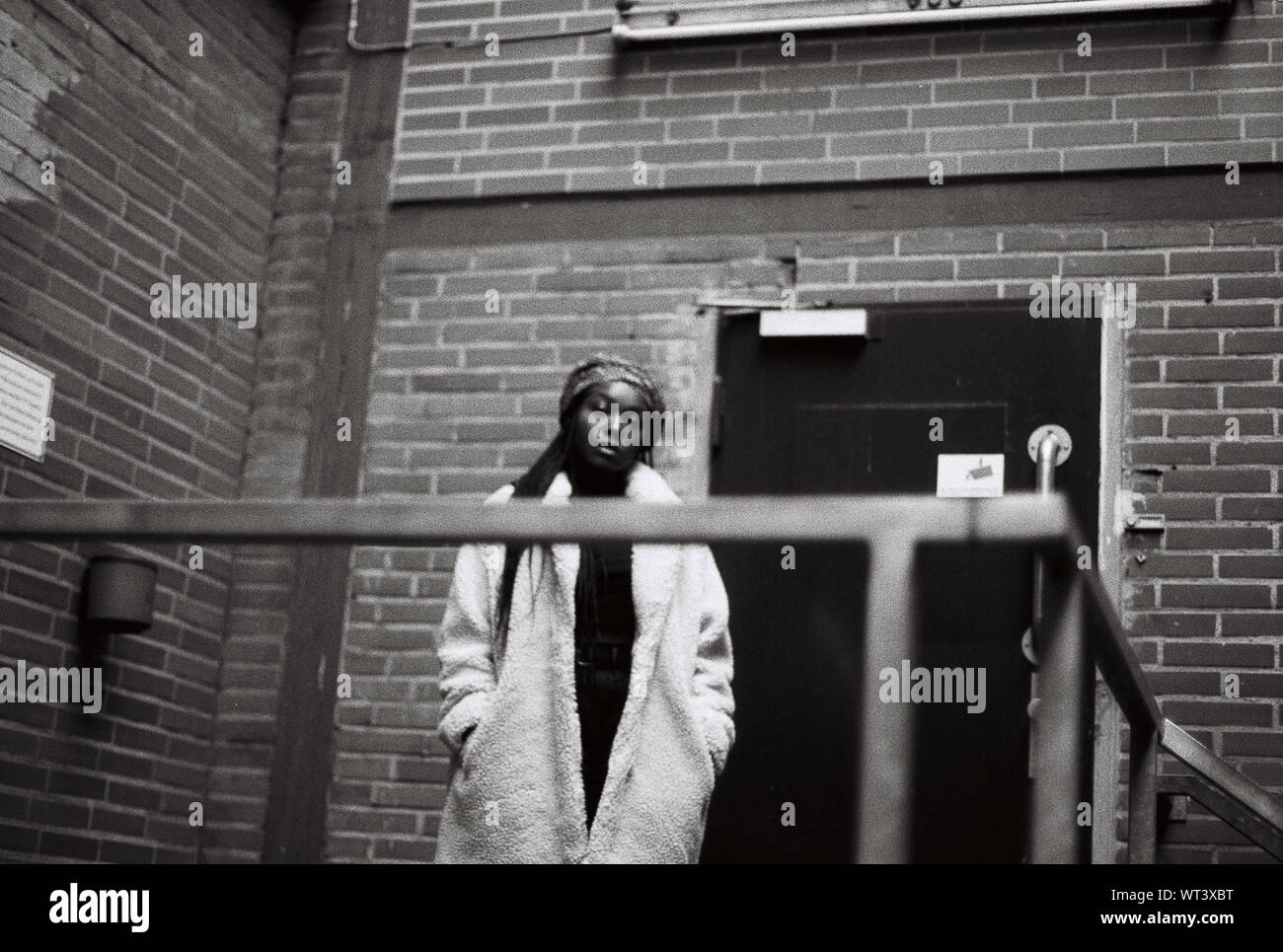 Woman Standing In Balcony At City Stock Photo - Alamy