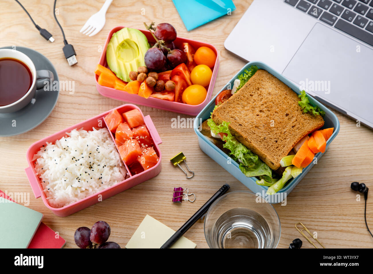Flat lay with healthy lunch dishes variety: sandwich, salad and fruit ...