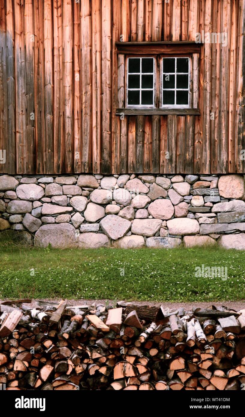 Stacks Of Logs Outside House Stock Photo - Alamy