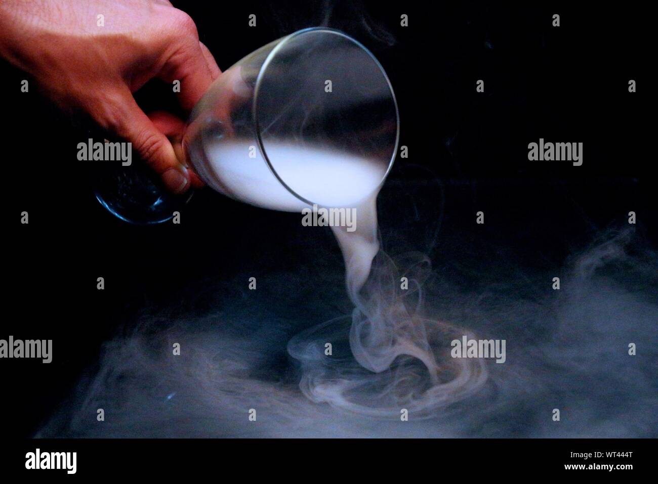 Pouring one out hi-res stock photography and images - Alamy