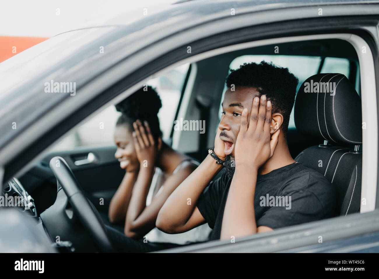 Young couple driving car on high speed Stock Photo - Alamy