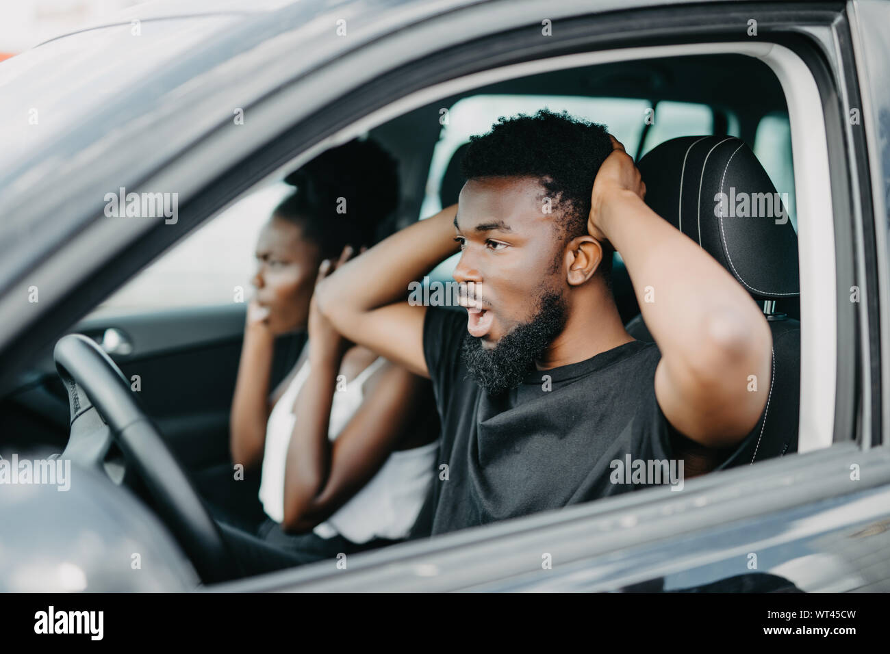 Young couple driving car on high speed Stock Photo - Alamy