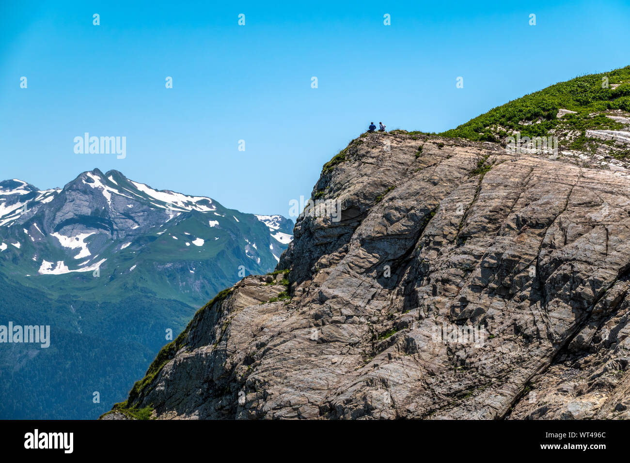 Two men hiking mountains sunset hi-res stock photography and images - Alamy