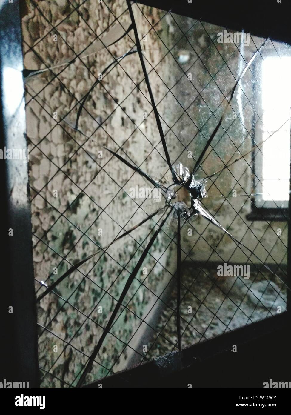 Broken glass wall hi-res stock photography and images - Alamy