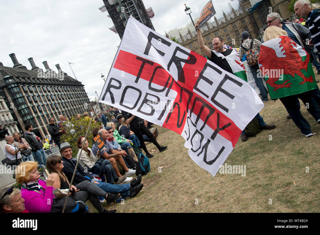 Protests in Parliament Square. Leavers with a English flag with 'Free ...