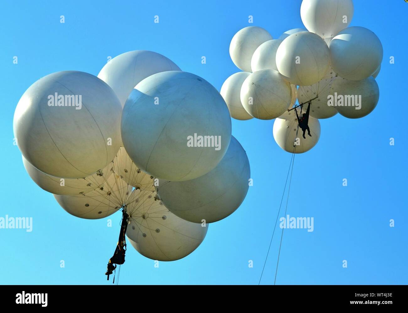 Flying away balloon hi-res stock photography and images - Alamy