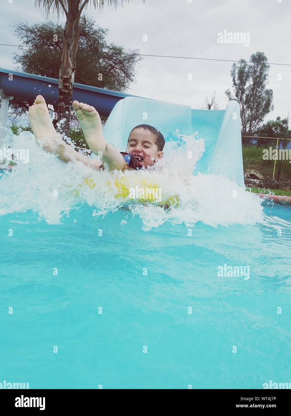 Boy and splash hi-res stock photography and images - Alamy