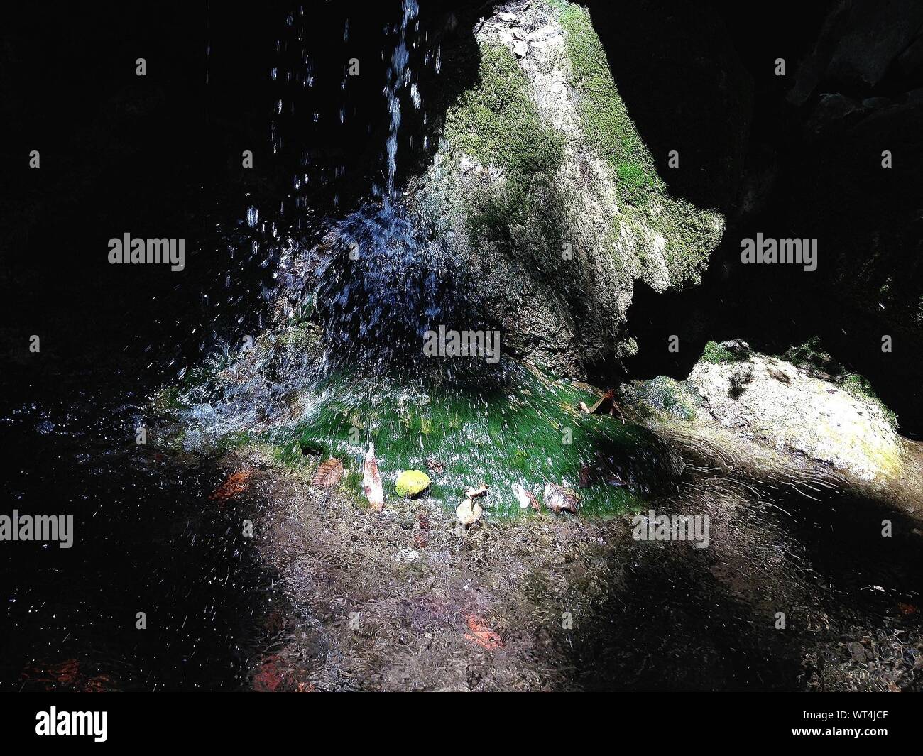 Small cave waterfall hi-res stock photography and images - Alamy