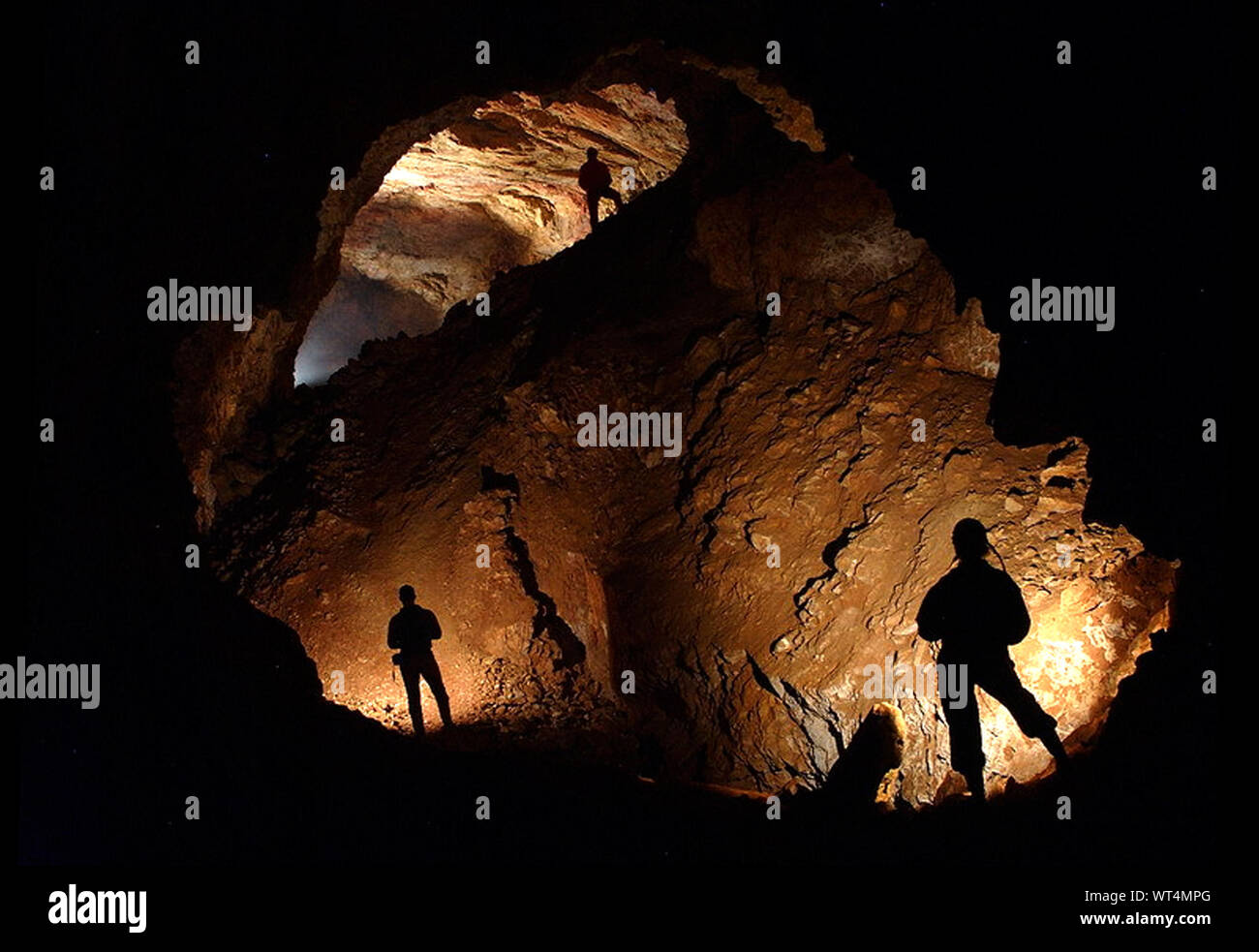People exploring cave hi-res stock photography and images - Alamy