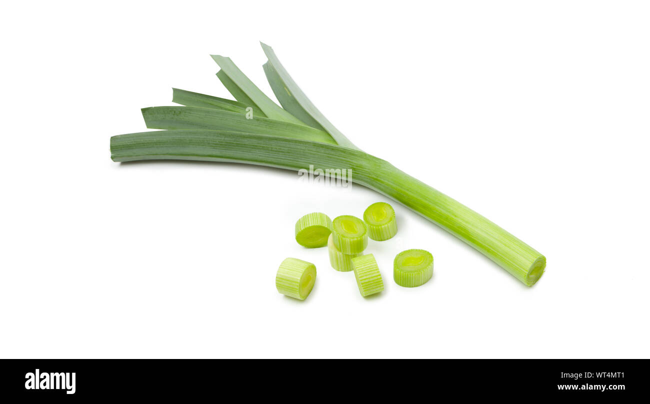 Green leek sliced isolated on white background Stock Photo - Alamy