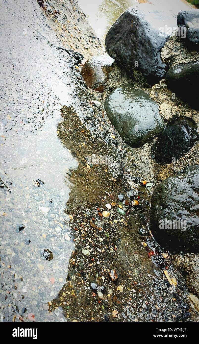Rain puddle rock hi-res stock photography and images - Alamy