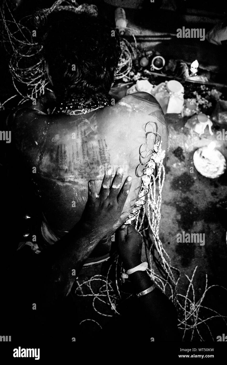 Ritual piercing hi-res stock photography and images - Alamy