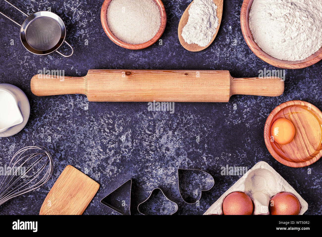 Ingredients for baking - flour, wooden spoon, rolling pin, eggs. Top ...