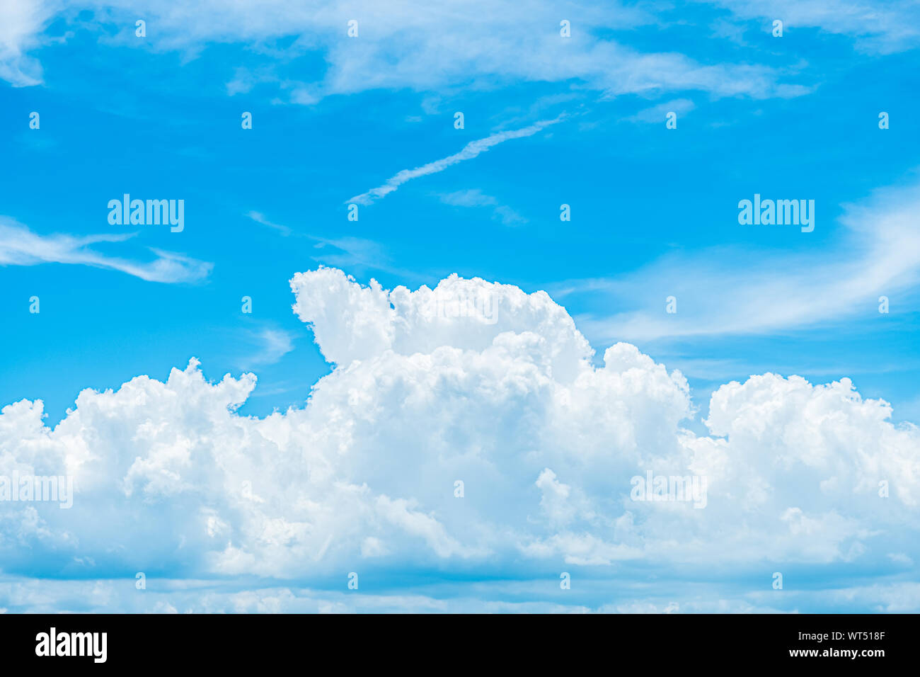 White clouds in blue sky, abstract blurred background Stock Photo - Alamy