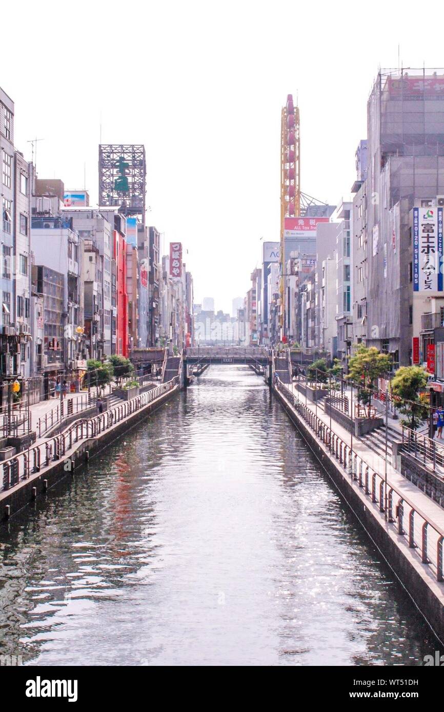 Narrow Canal Along Buildings Stock Photo - Alamy