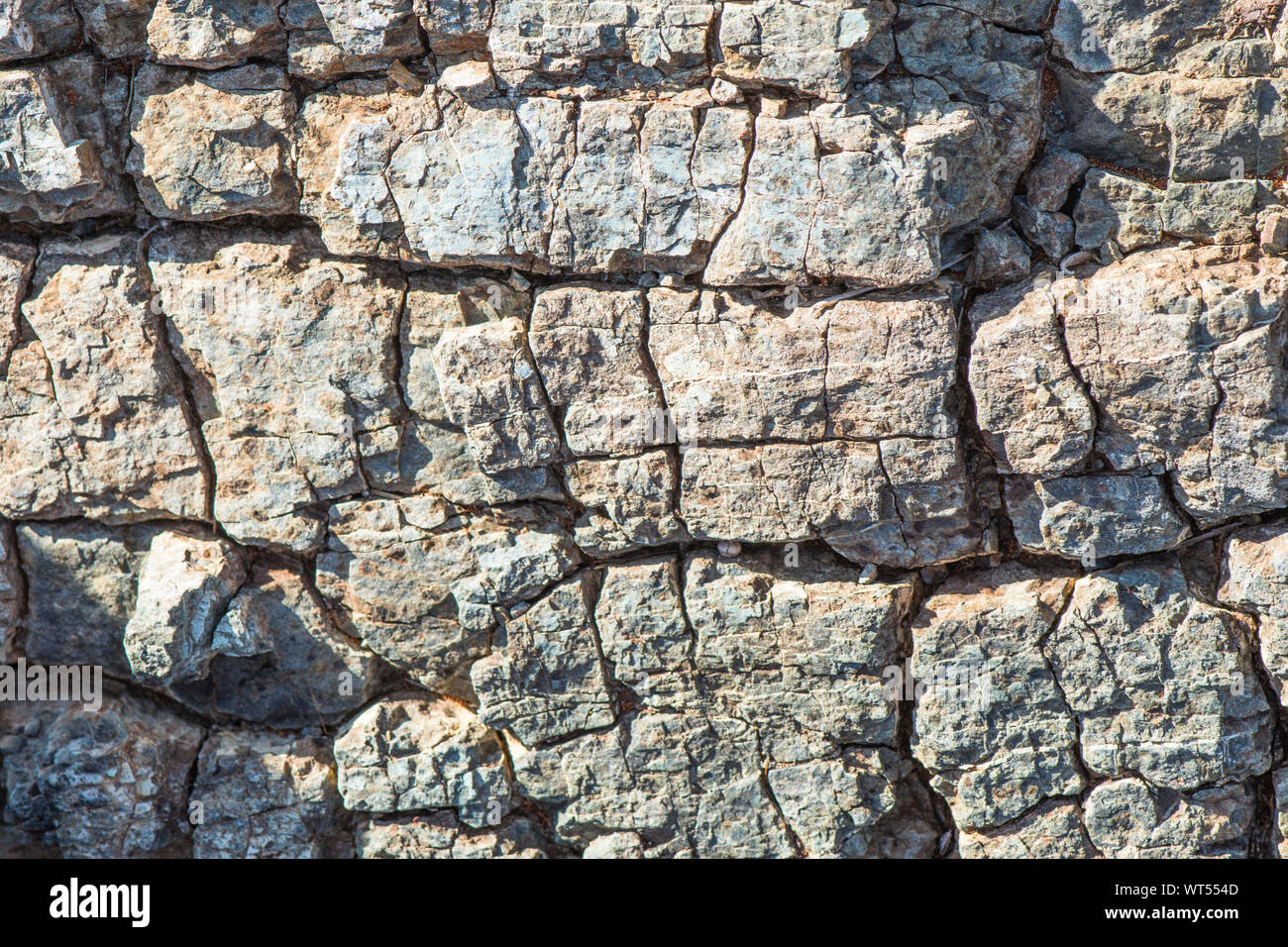 Cracks in rock background hi-res stock photography and images - Alamy