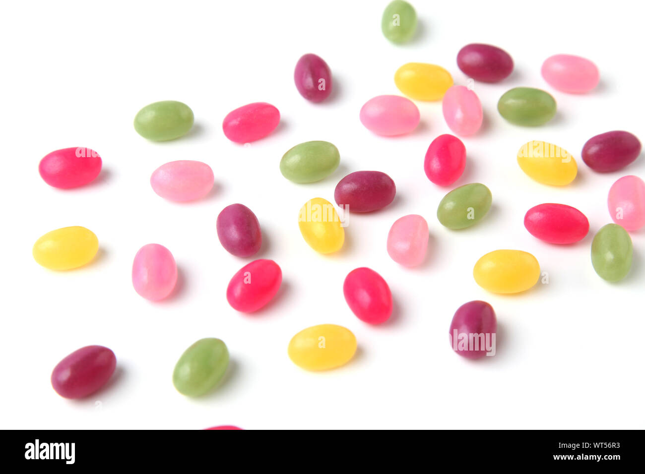 colorful candies jelly beans spread isolated on white background Stock ...