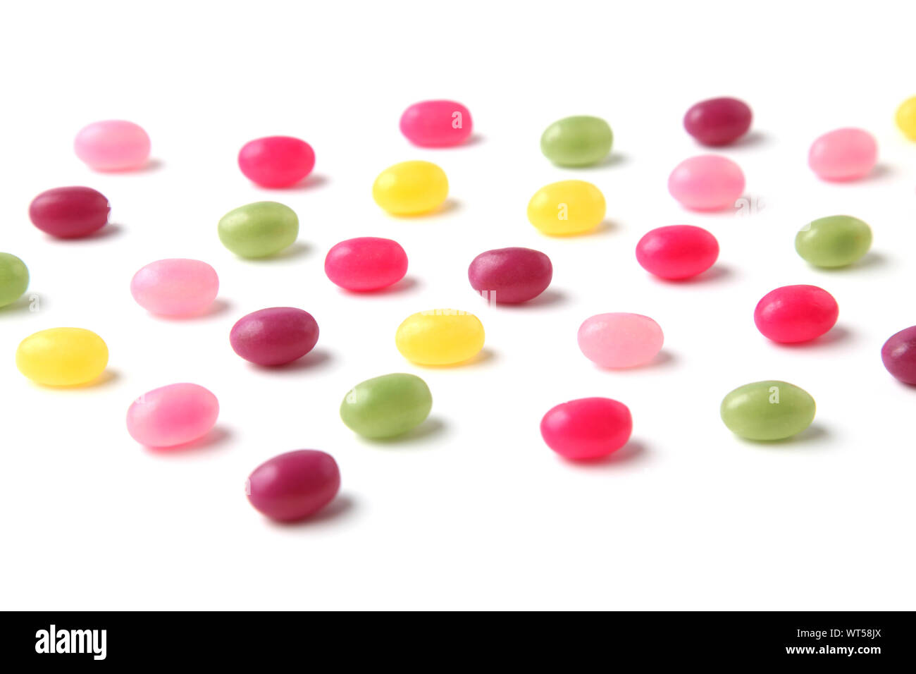colorful candies jelly beans spread isolated on white background Stock ...