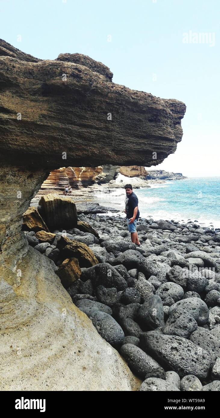 Beach side rocks hi-res stock photography and images - Alamy
