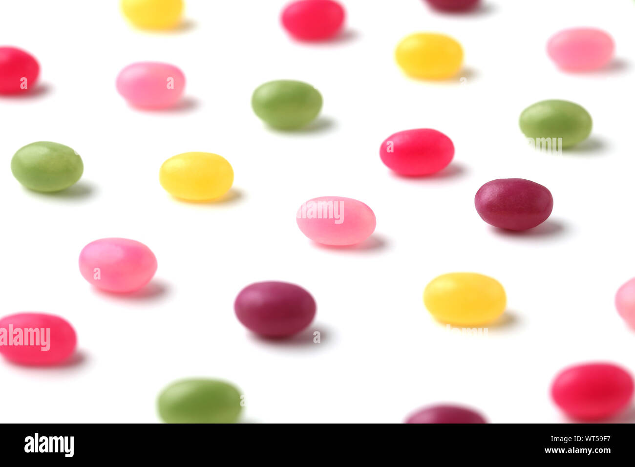 colorful candies jelly beans spread isolated on white background Stock ...