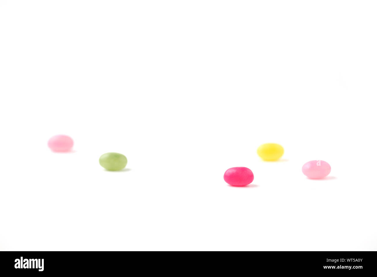 colorful candies jelly beans spread isolated on white background Stock ...