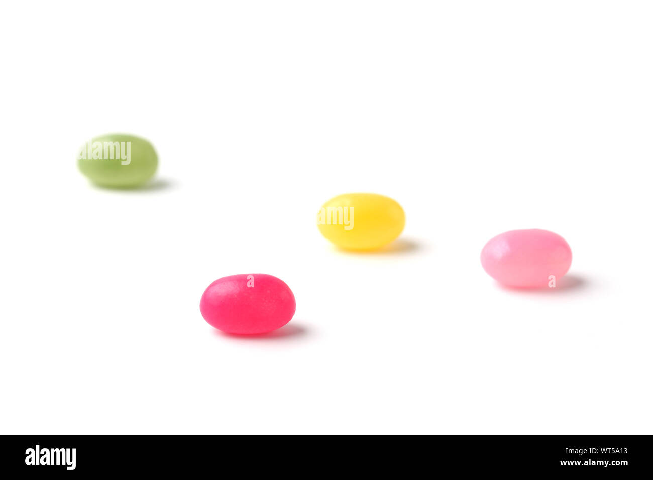 colorful candies jelly beans spread isolated on white background Stock ...