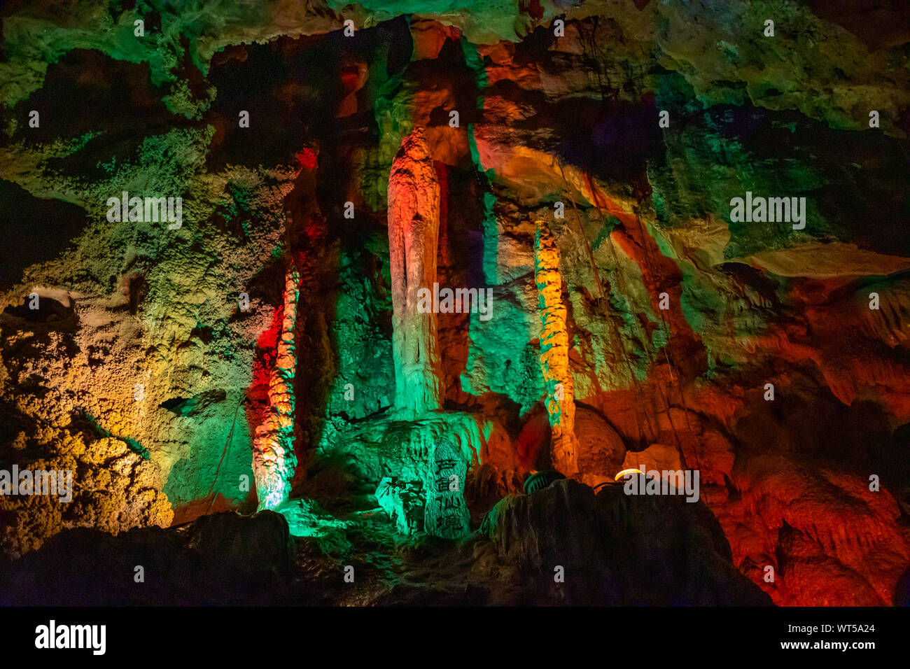 Beautiful illuminated multicolored stalactites in Danzhou Stone Flower ...