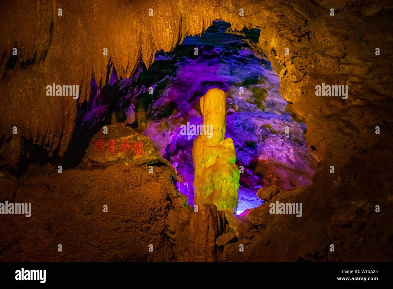 Beautiful illuminated multicolored stalactites in Danzhou Stone Flower ...