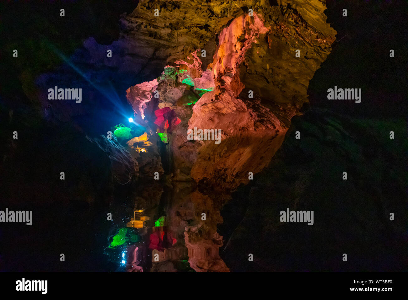 Beautiful illuminated multicolored stalactites in Danzhou Stone Flower ...