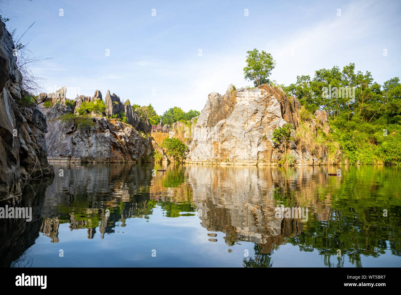 Lake and roks in Danzhou Stone Flower Caves, Geopark next to Haikou ...