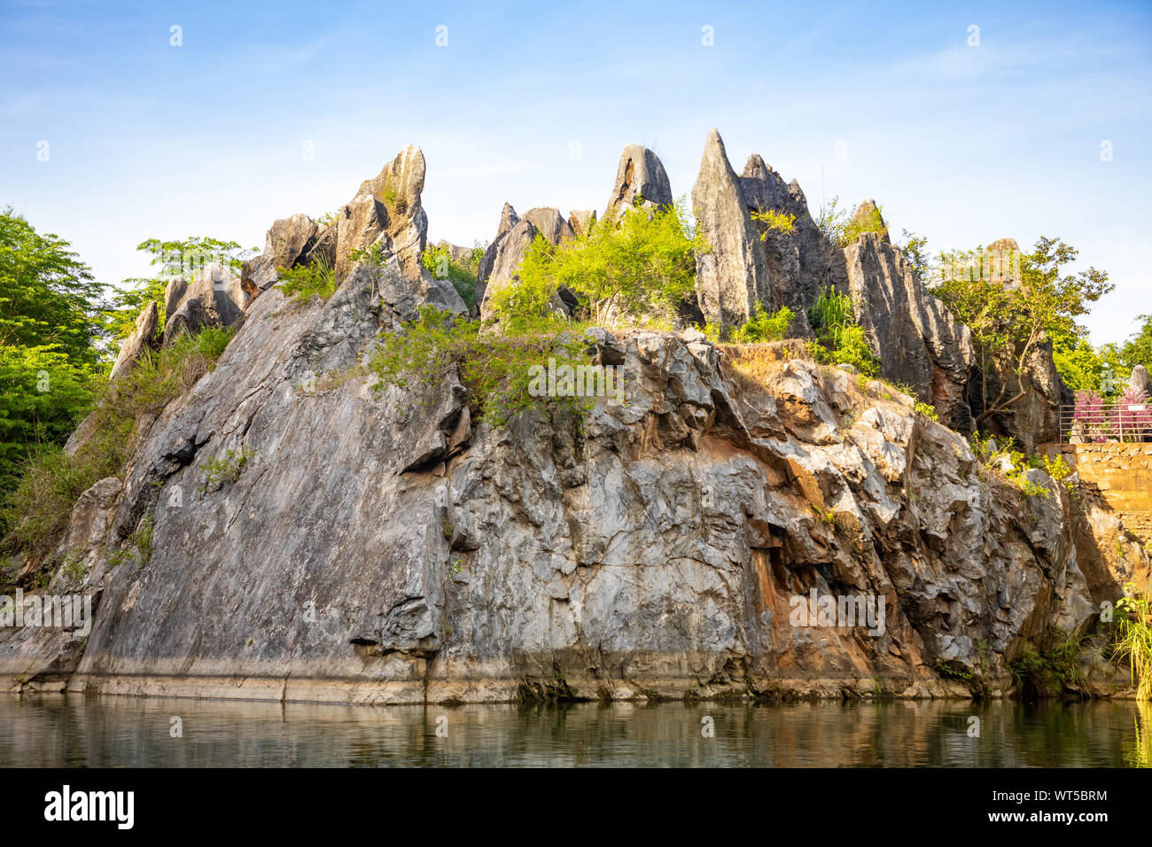 Lake and roks in Danzhou Stone Flower Caves, Geopark next to Haikou ...
