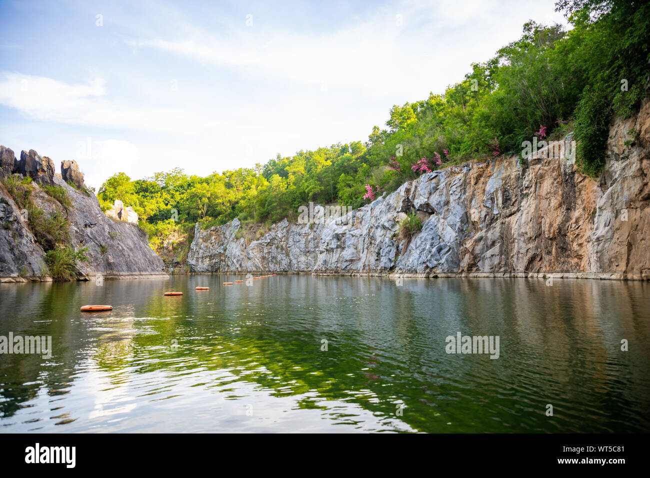 Lake and roks in Danzhou Stone Flower Caves, Geopark next to Haikou ...