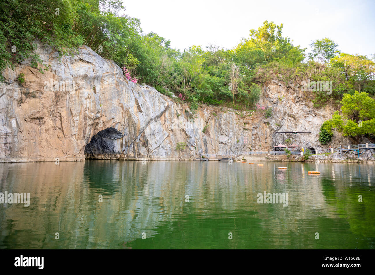 Lake and roks in Danzhou Stone Flower Caves, Geopark next to Haikou ...
