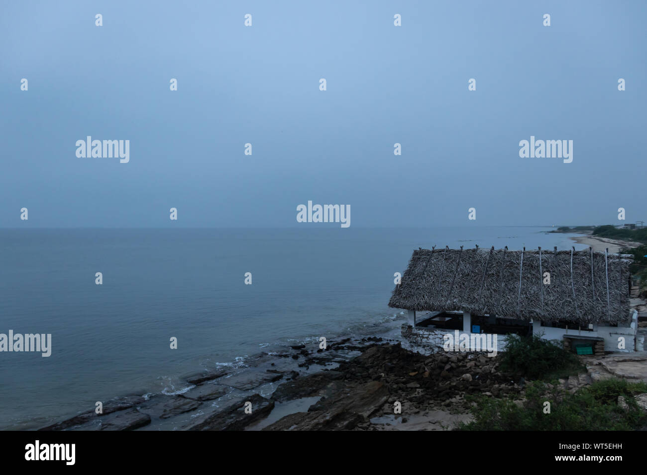 Rustic village home in dawn near sea shore image is showing the silent ...
