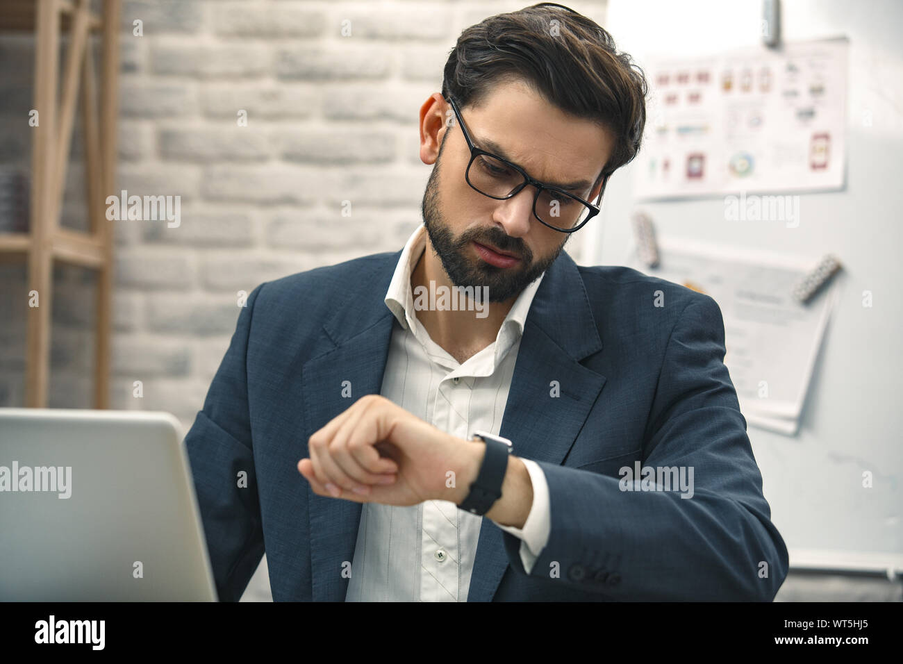 Waiting middle aged man checking hi-res stock photography and images ...
