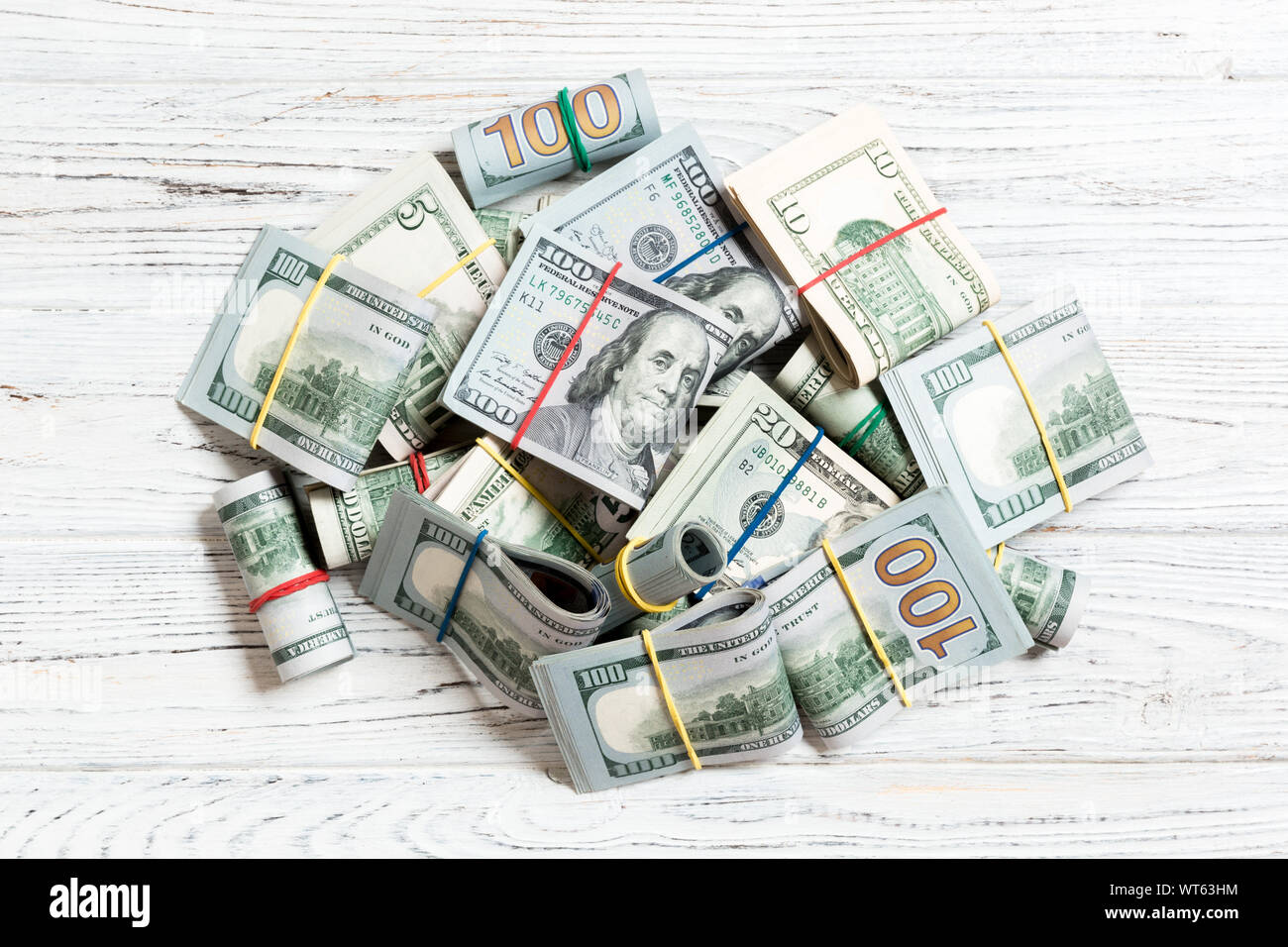 US Dollar bills bundles stack. one hundred dollar bills with stack of ...