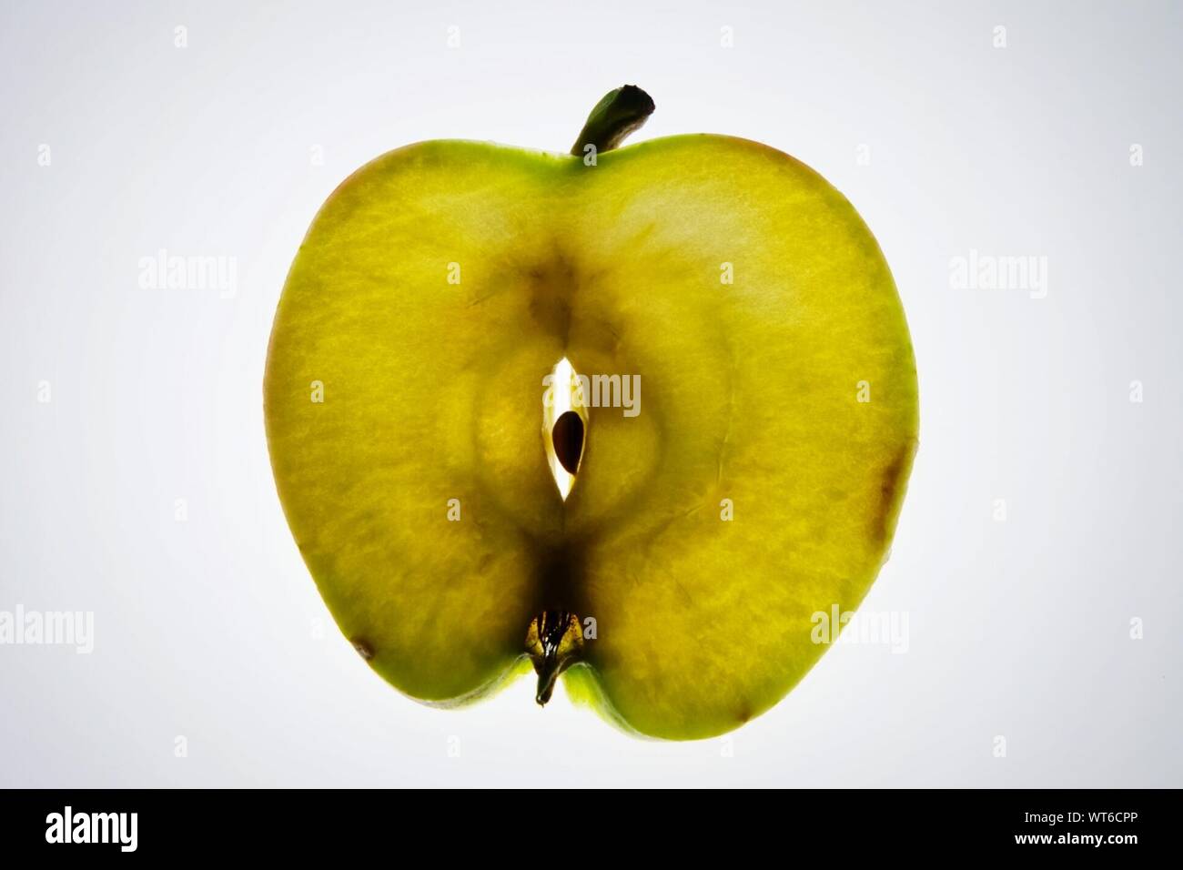 Cross Section Of Apple Slice Over White Background Stock Photo - Alamy