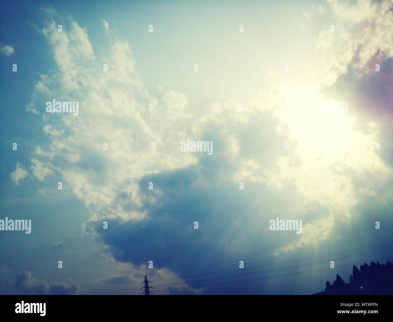 Cloudy with sun hi-res stock photography and images - Alamy